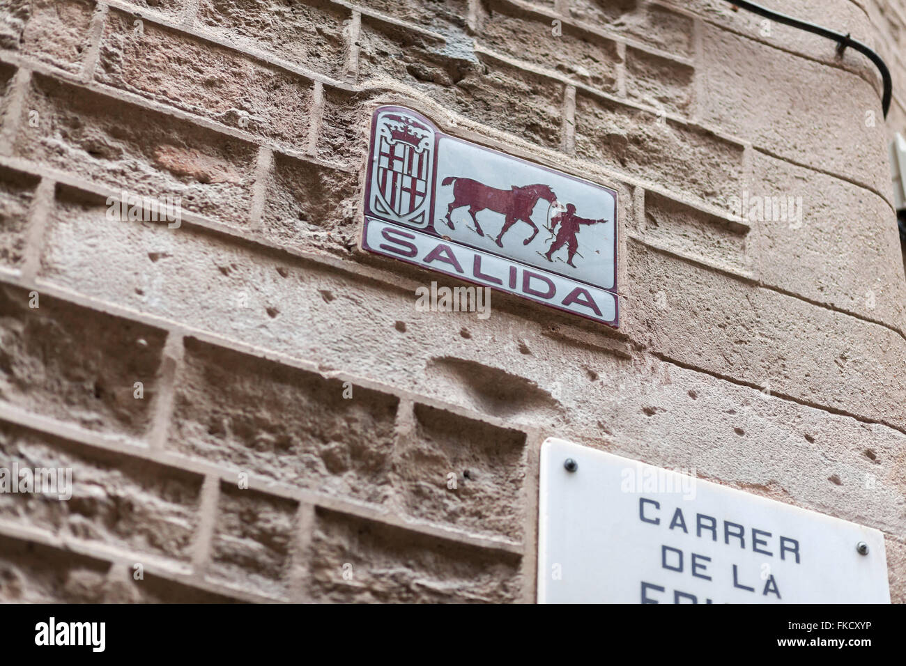 Old sign exit horses in the street city.Ciutat Vella, Barcelona Stock ...