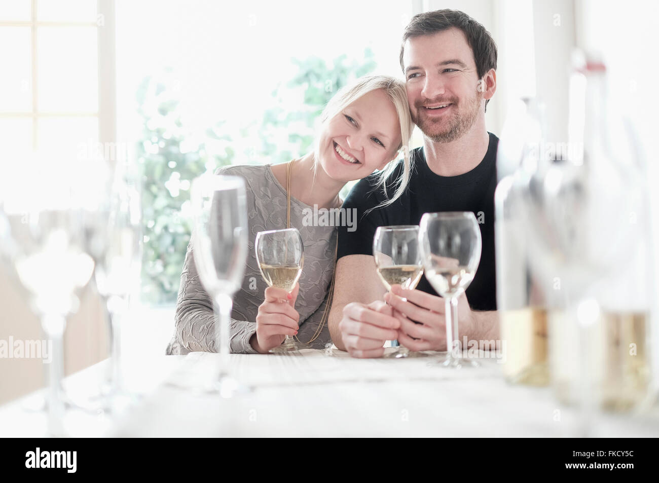 Couple sitting table hi-res stock photography and images - Alamy