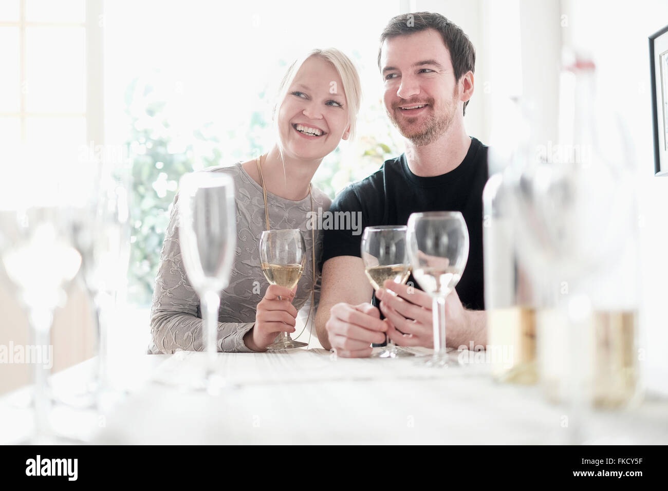 Couple sitting table hi-res stock photography and images - Alamy