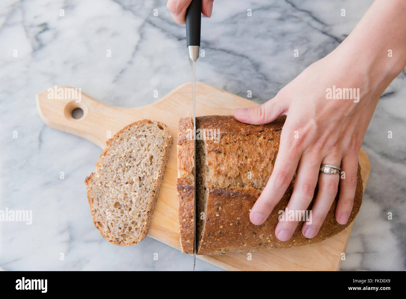 Womans hands holding loaf hi-res stock photography and images - Alamy