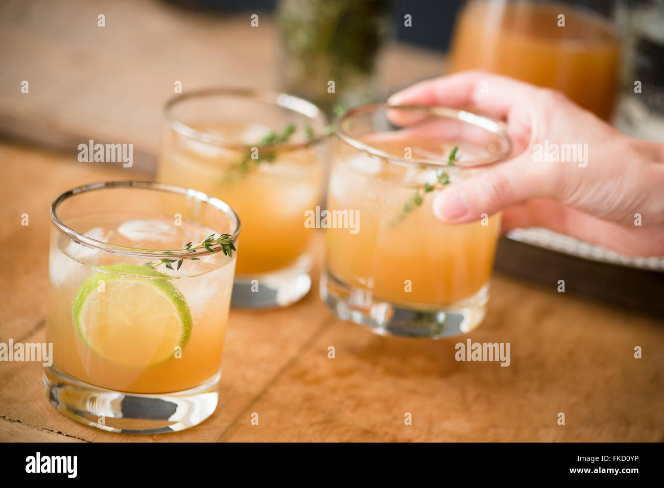 Hand holding alcoholic drink hi-res stock photography and images - Alamy