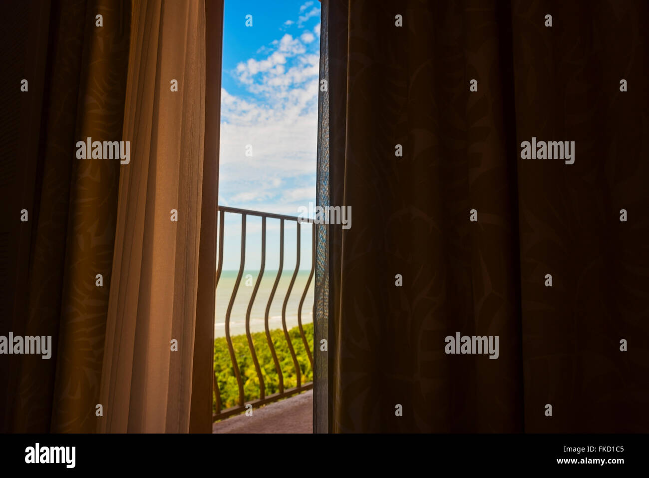 Clouds over see seen from hotel room Stock Photo - Alamy