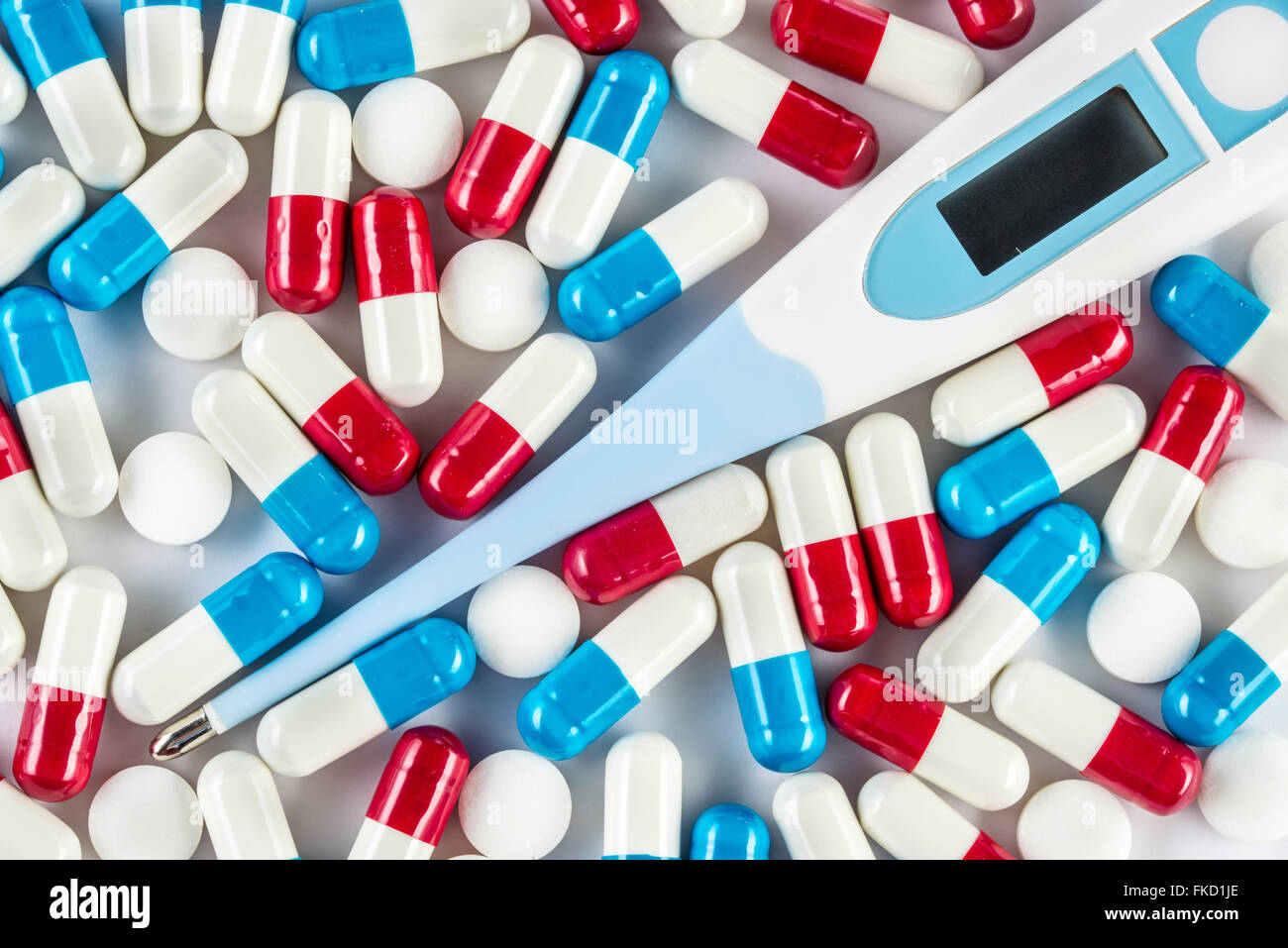 thermometer with pills and Capsule, Fever headache flu unwell Stock ...