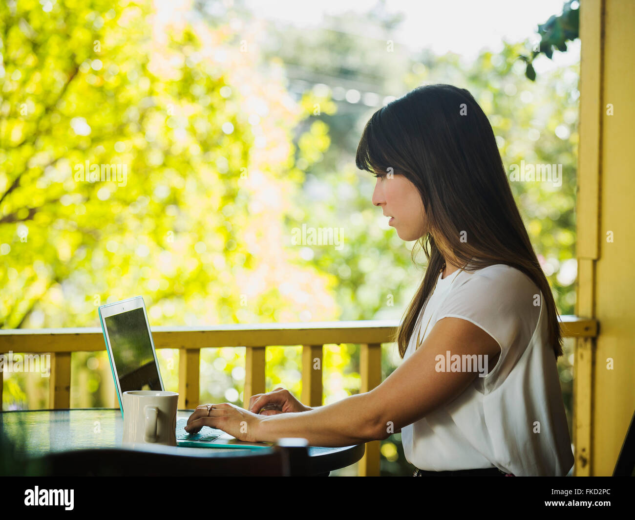 Young woman working laptop writing hi-res stock photography and images ...