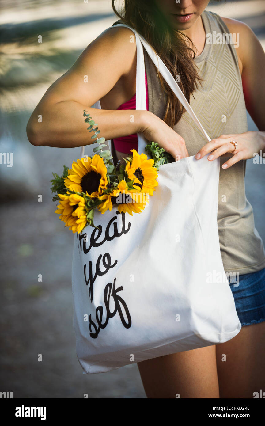 Woman searching bag hi-res stock photography and images - Alamy