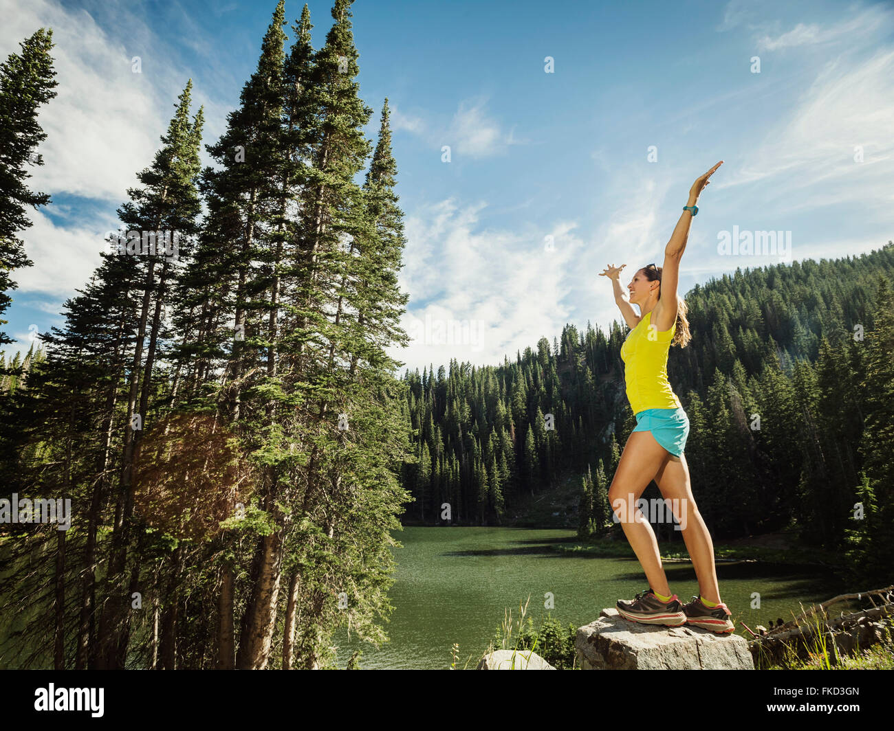 Person standing on rock hi-res stock photography and images - Alamy