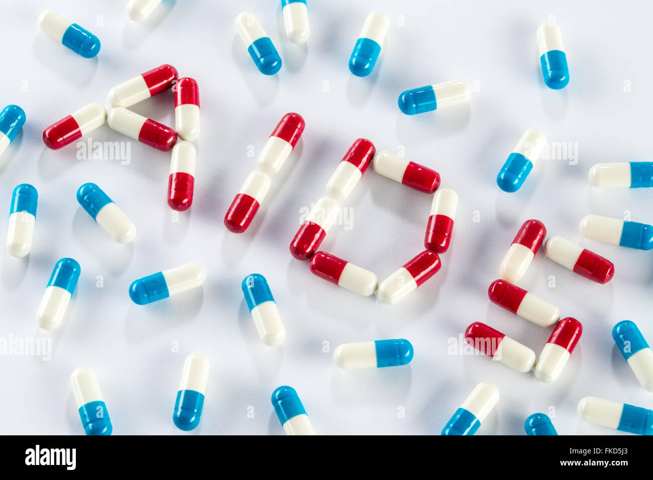 red capsule and blue capsule in AIDS WORLD, HIV medication Stock Photo ...