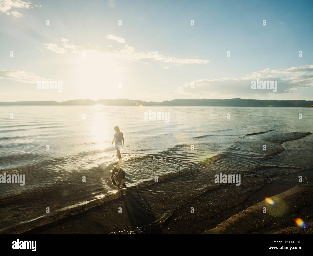 Wading into surf hi-res stock photography and images - Alamy