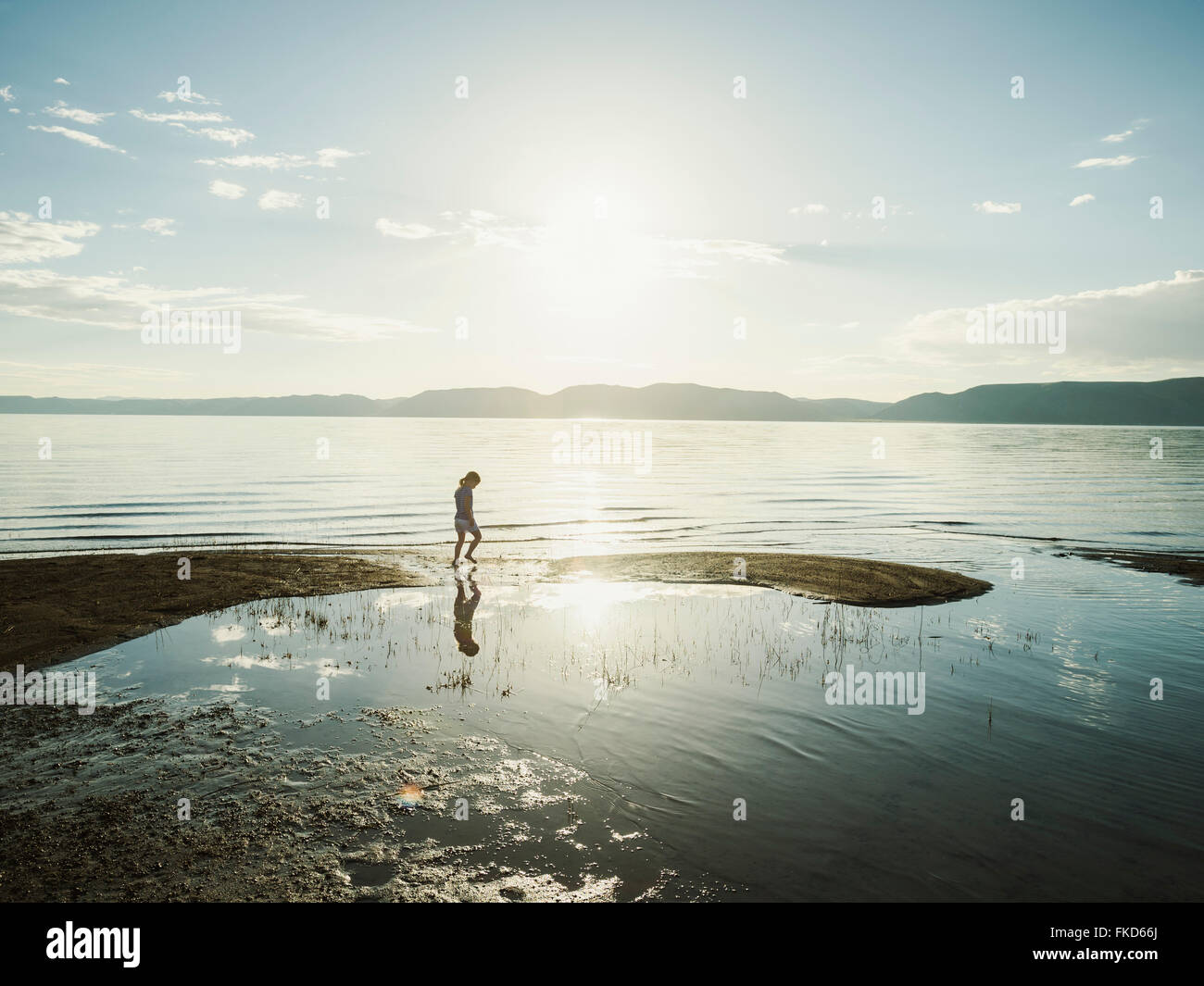 Wading into surf hi-res stock photography and images - Alamy