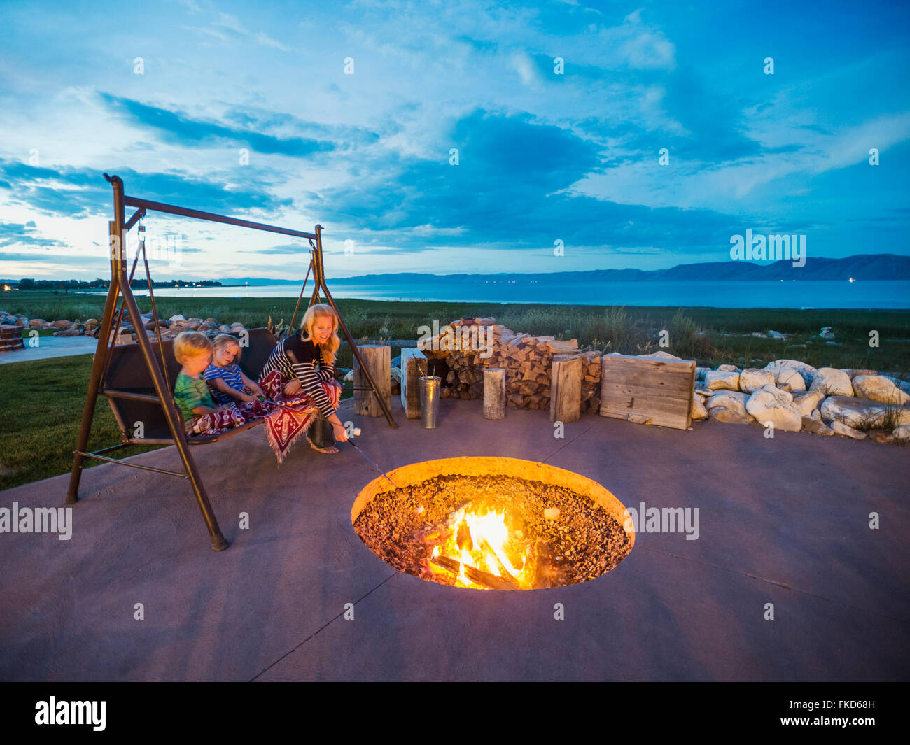 Boys sitting campfire in hi-res stock photography and images - Alamy