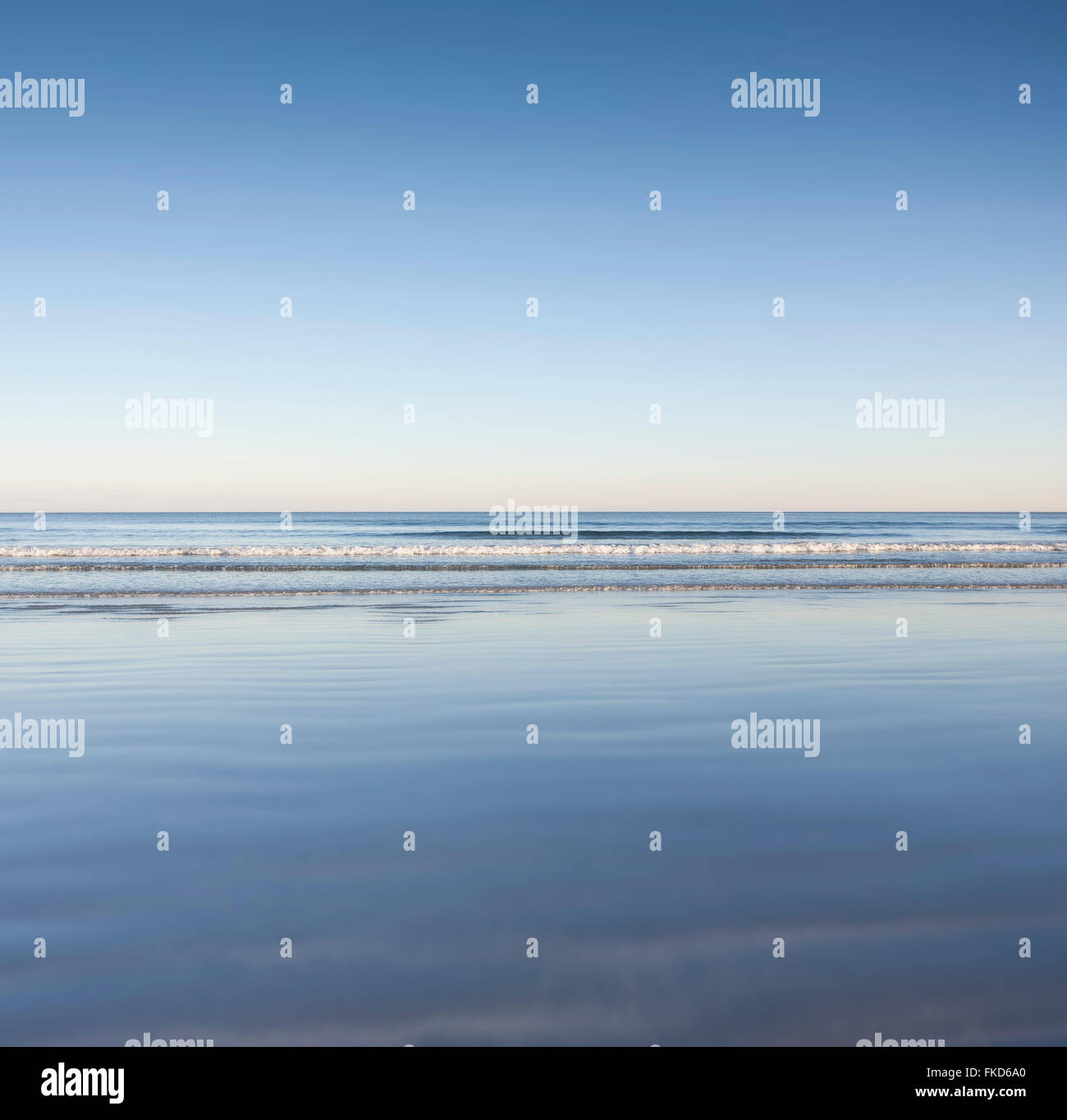 Seascape with blue sky Stock Photo - Alamy