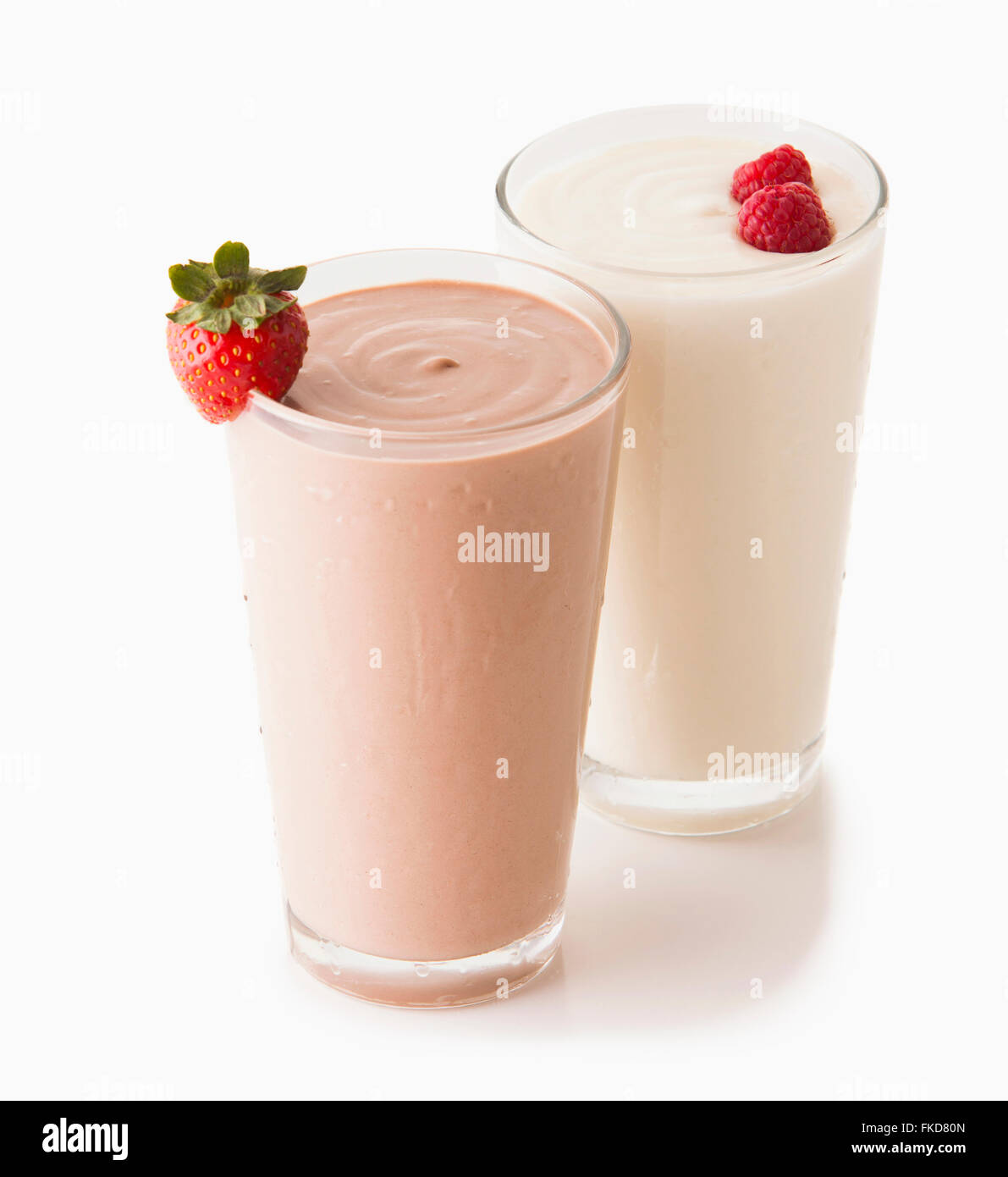 Smoothies in glasses decorated with fruit Stock Photo - Alamy