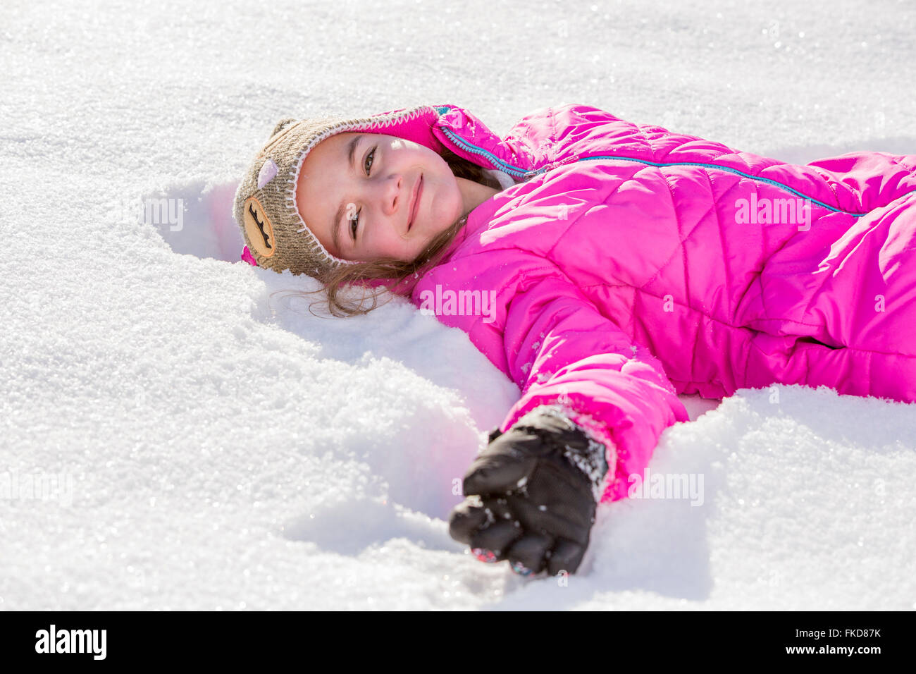 Lying in snow hi-res stock photography and images - Alamy