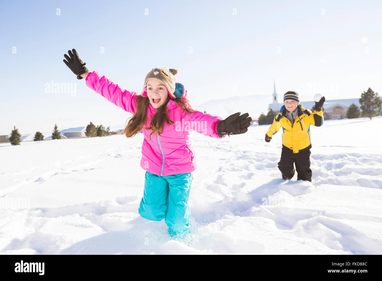 Children playing in snow hi-res stock photography and images - Alamy
