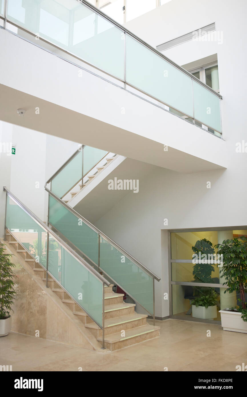 Marble stairs in a modern building. Vertical Stock Photo - Alamy