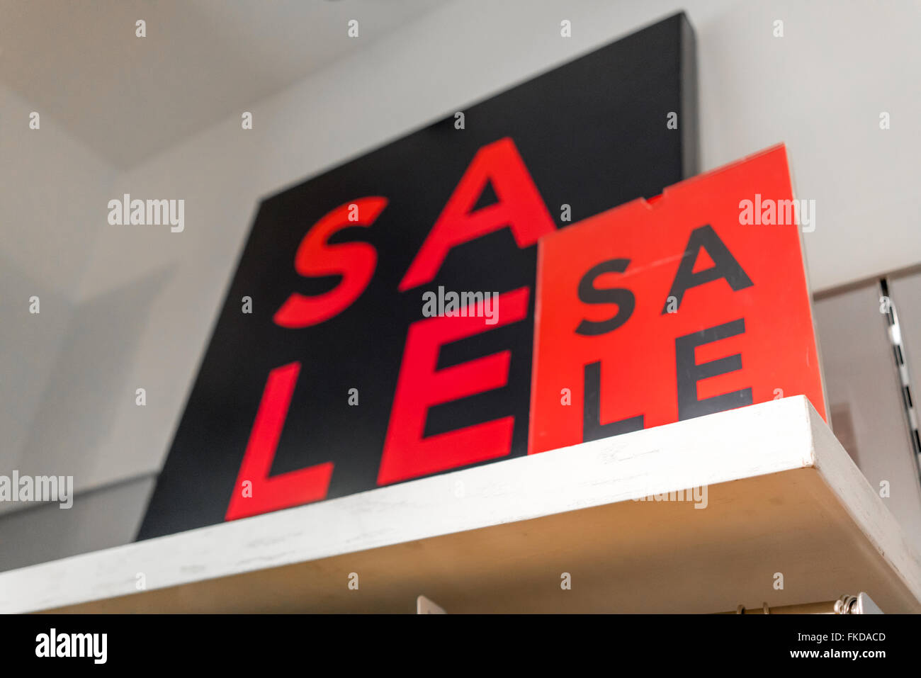 Sale sign on shop Stock Photo - Alamy