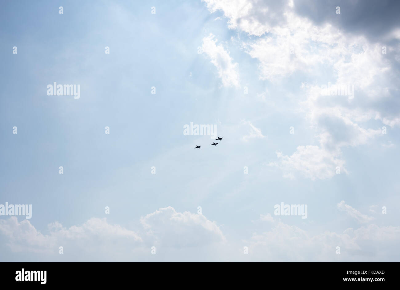 Low angle view of fighter airplanes performing airshow in sky Stock ...
