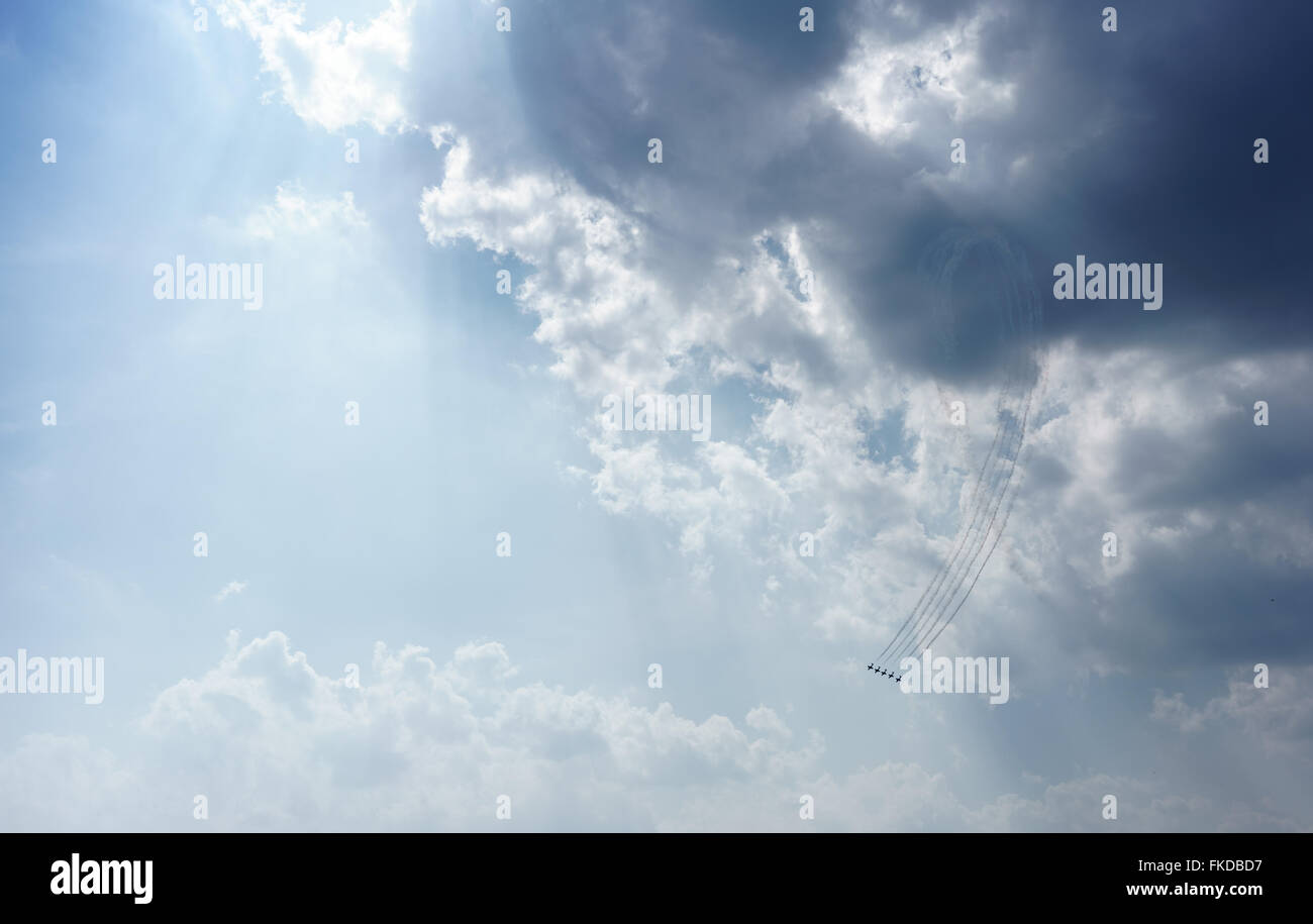 Low angle view of fighter aeroplanes performing airshow in sky Stock ...