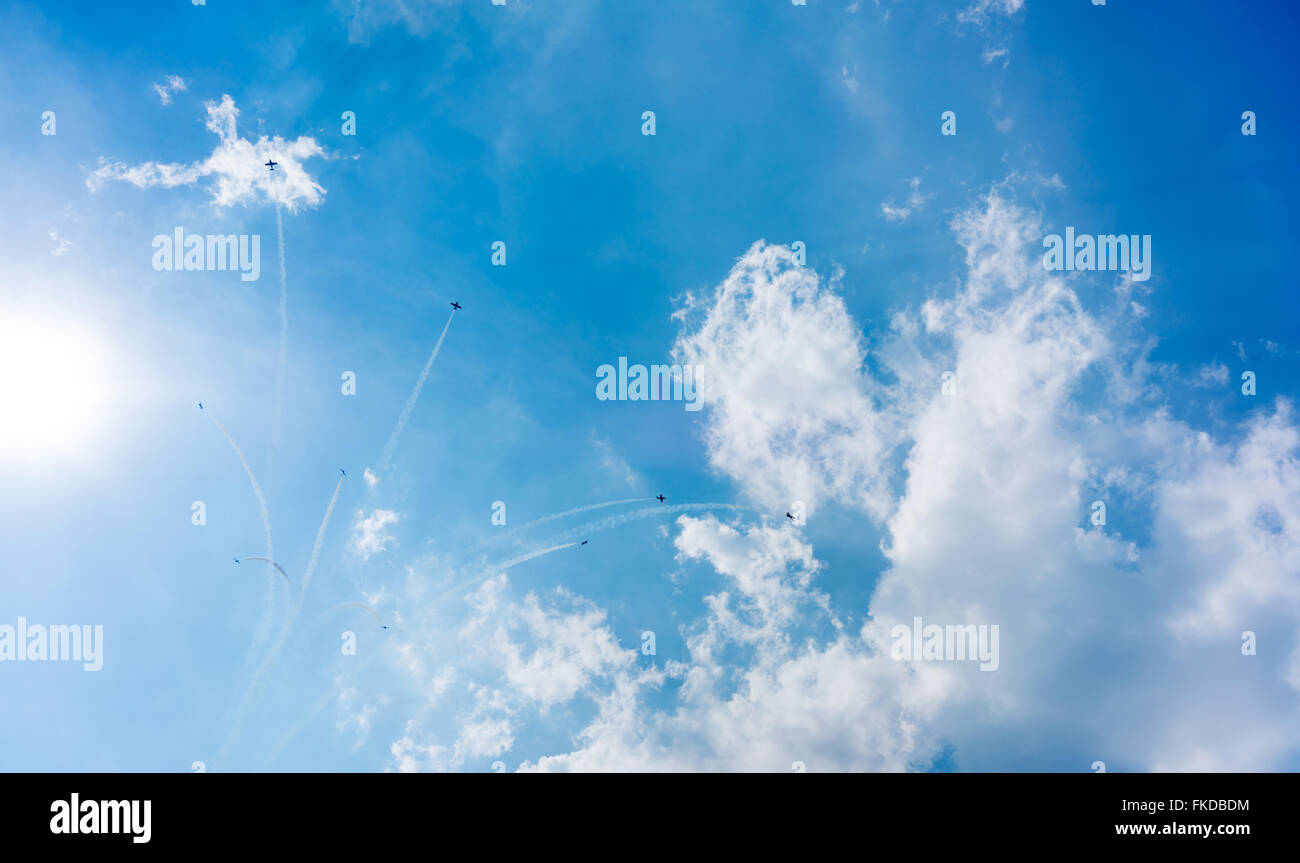 Low angle view of fighter aeroplanes performing airshow in sky Stock ...