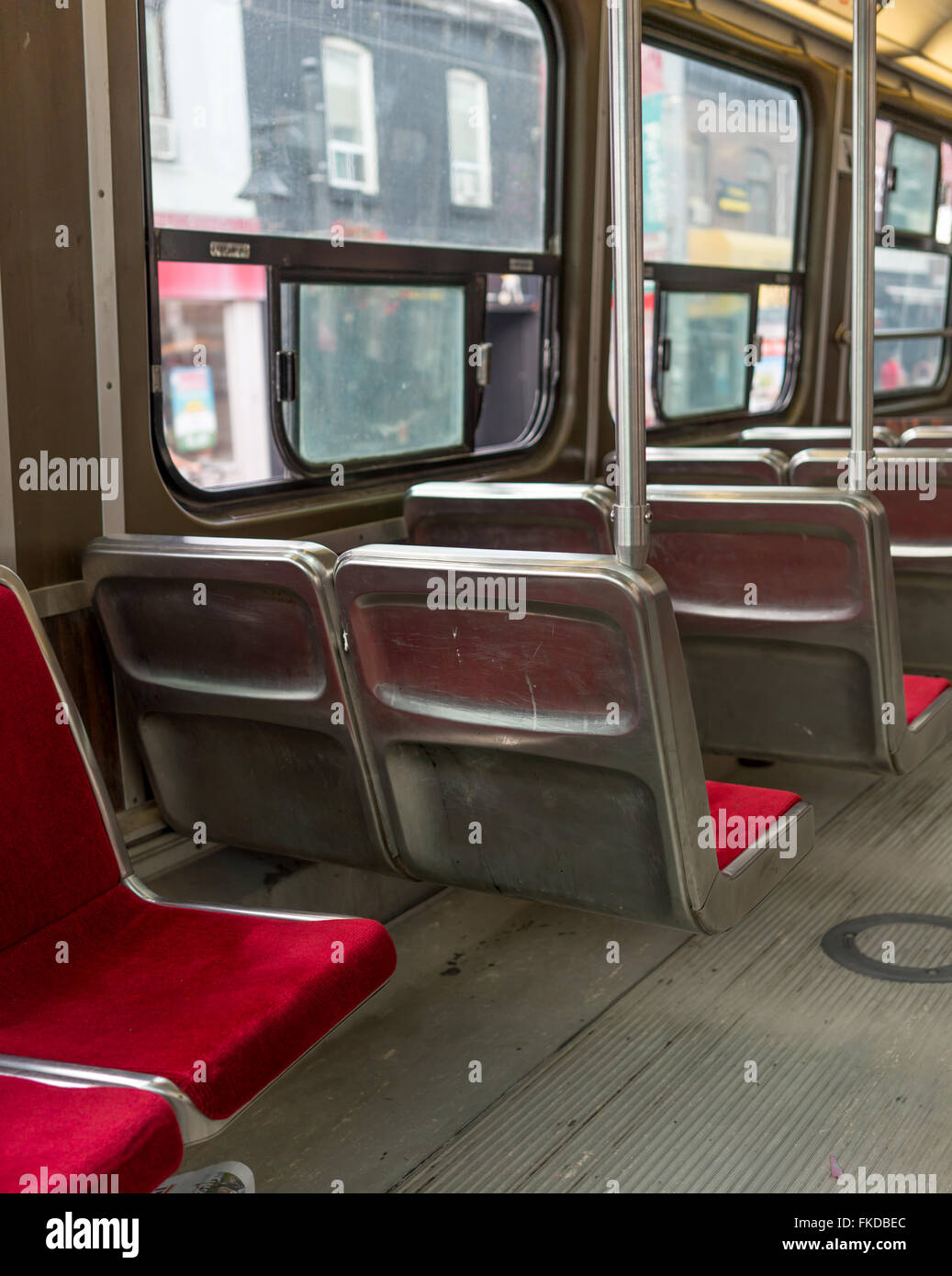 Interiors of bus with building seen from window Stock Photo - Alamy