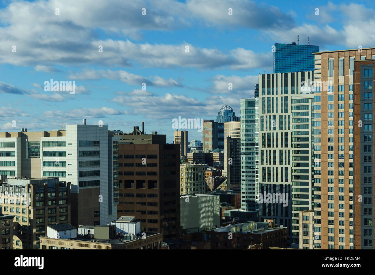 Cloudy sky above downtown district Stock Photo - Alamy