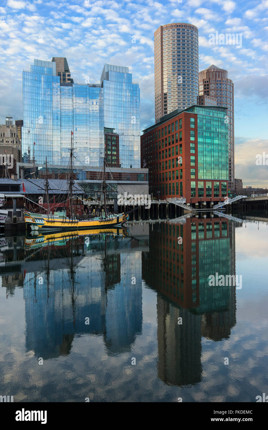 Waterfront buildings reflecting in water Stock Photo - Alamy