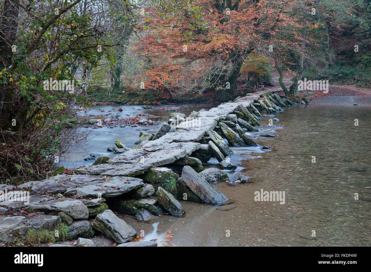 Tarr Steps clapper bridge across the River Barle, Exmoor National Park ...