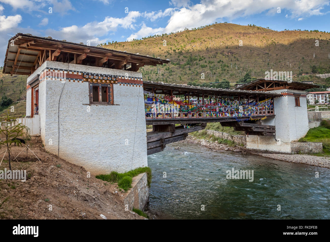 Bridge with prayer flags over Wang Chhu river in Thimphu, Bhutan Stock ...