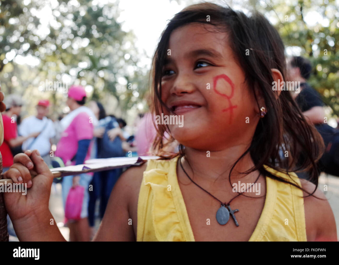 Manila, Philippines. 08th Mar, 2016. A child painted with a female ...