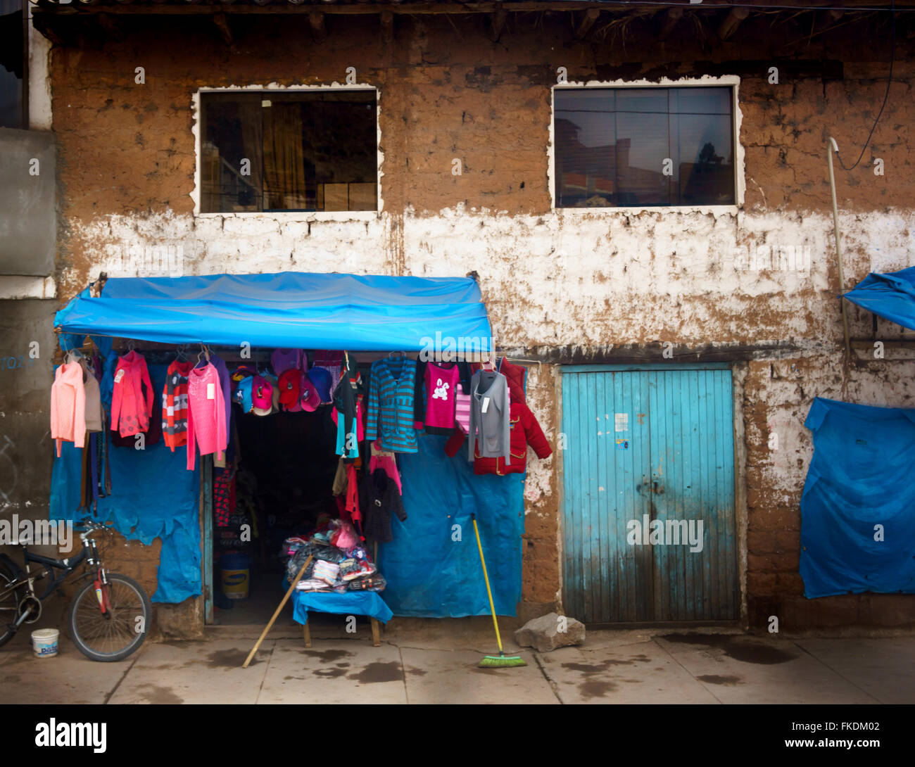 Clothes displayed at a street shop, Cusco, Peru Stock Photo - Alamy