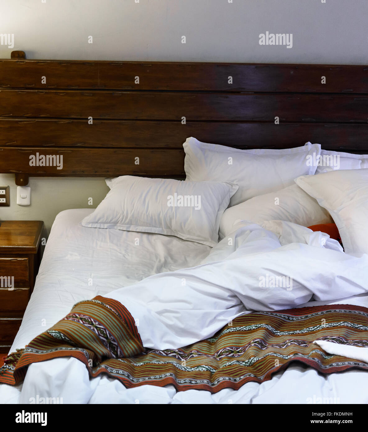 Unmade bed in hotel room Stock Photo - Alamy