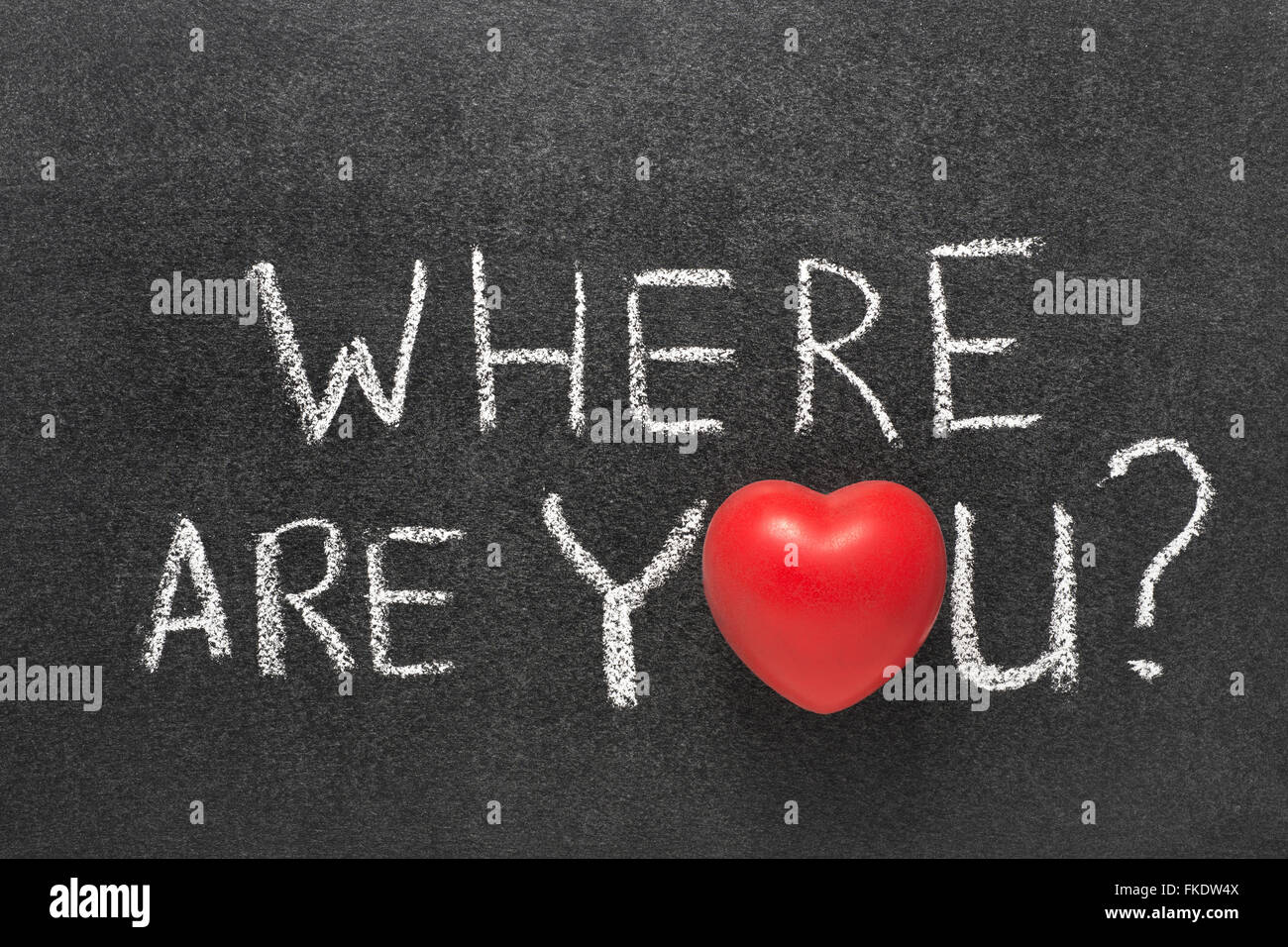where are you question handwritten on blackboard with heart symbol ...