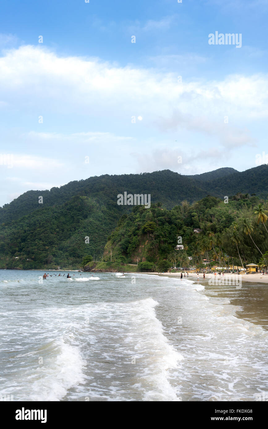 Surf on beach with mountain in background, Trinidad, Trinidad And ...