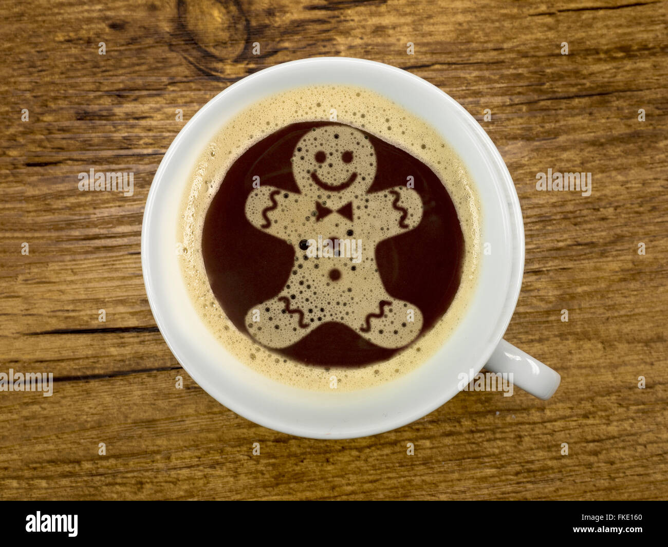 Gingerbread man in the coffee cup Stock Photo - Alamy