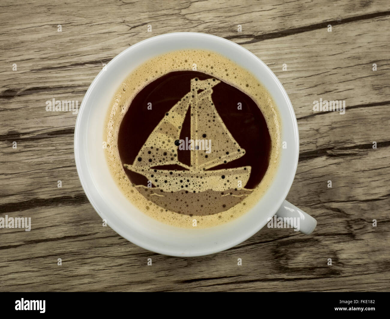 sailboat in the coffee cup Stock Photo - Alamy