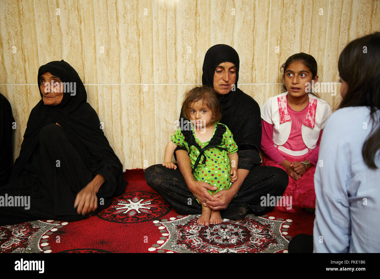 A kurdish family who lost their father, killed by Isis in Mosul Stock ...