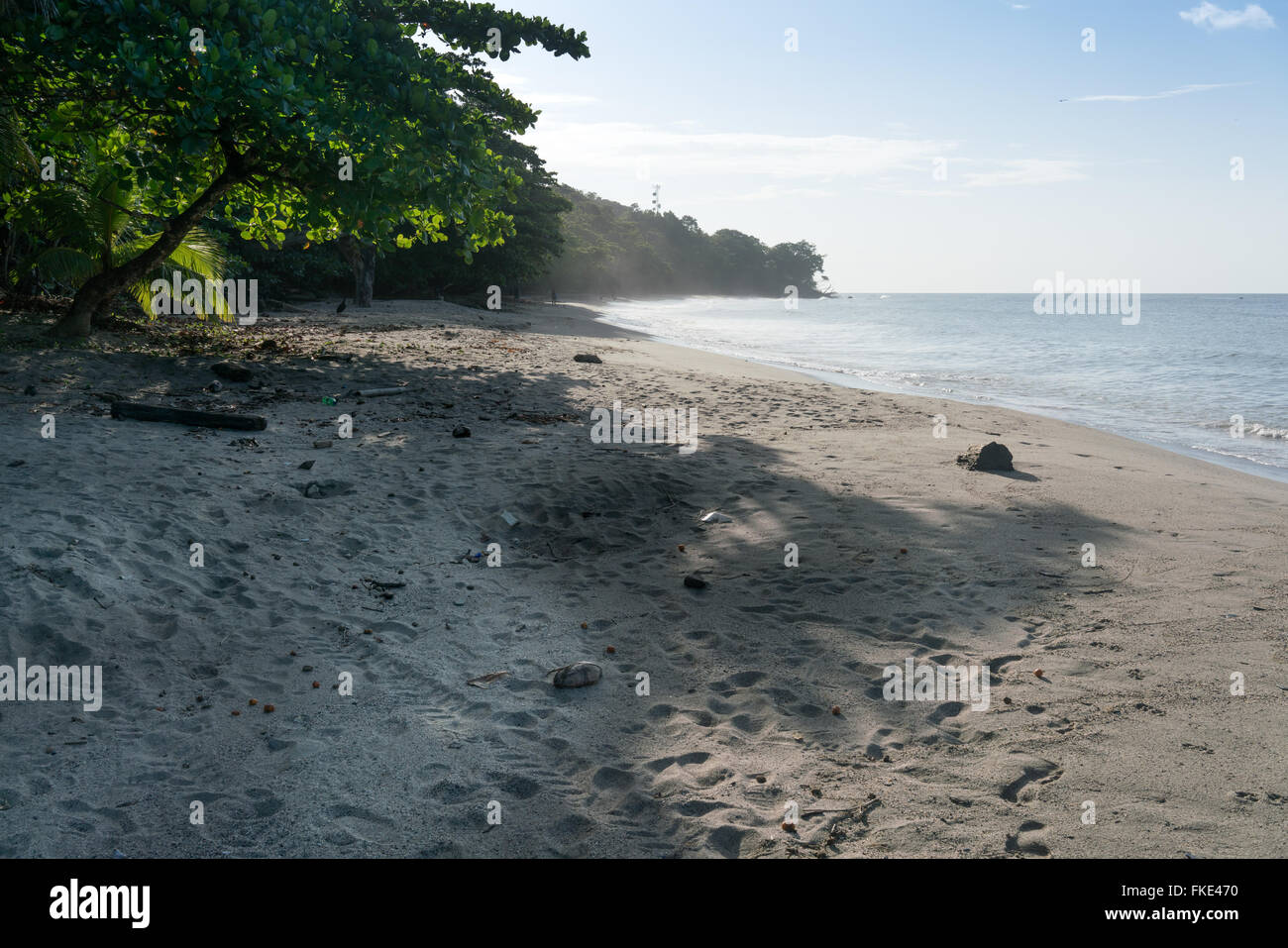 Scenic view of beach against sky, Trinidad, Trinidad And Tobago Stock ...