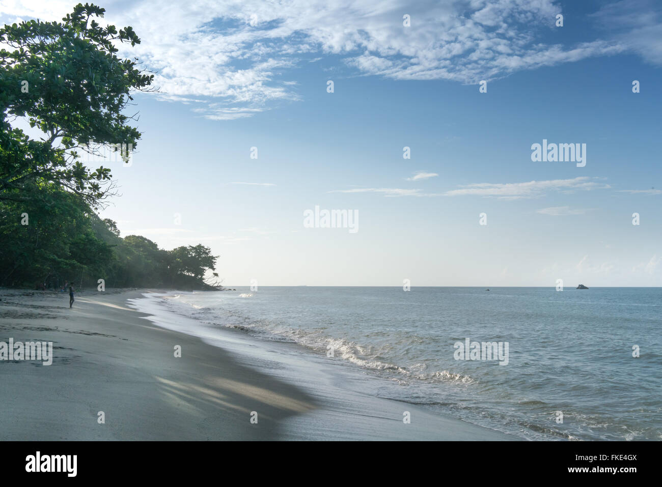 Scenic view of beach against sky, Trinidad, Trinidad And Tobago Stock ...