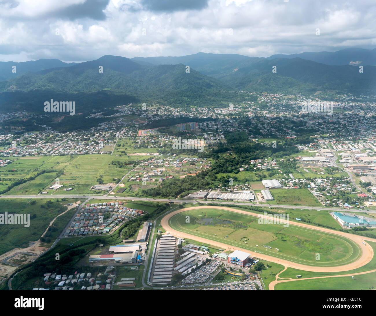 Aerial view of cityscape against cloudy sky, Trinidad, Trinidad and ...