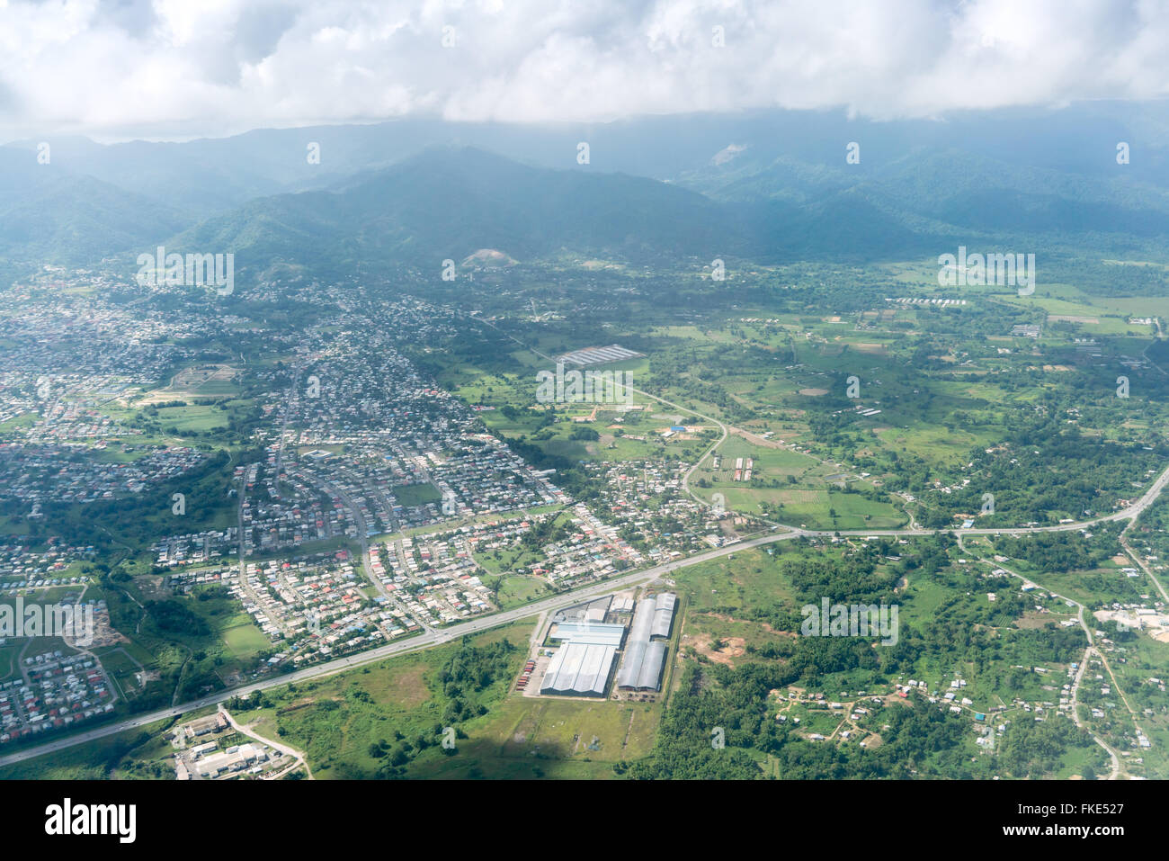 Aerial view of cityscape against cloudy sky, Trinidad, Trinidad and ...