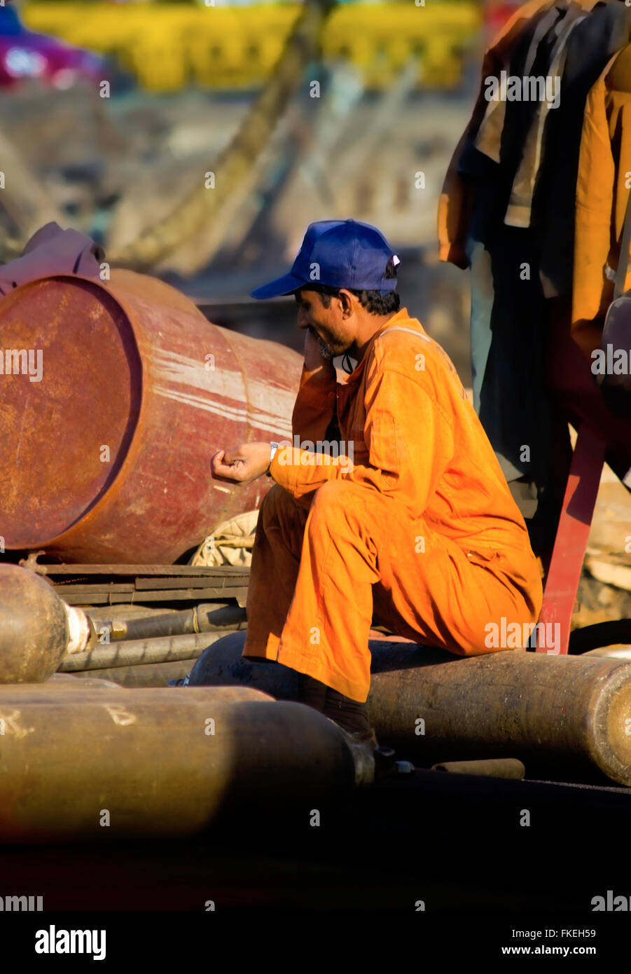 welding - Man talking on phone Stock Photo - Alamy