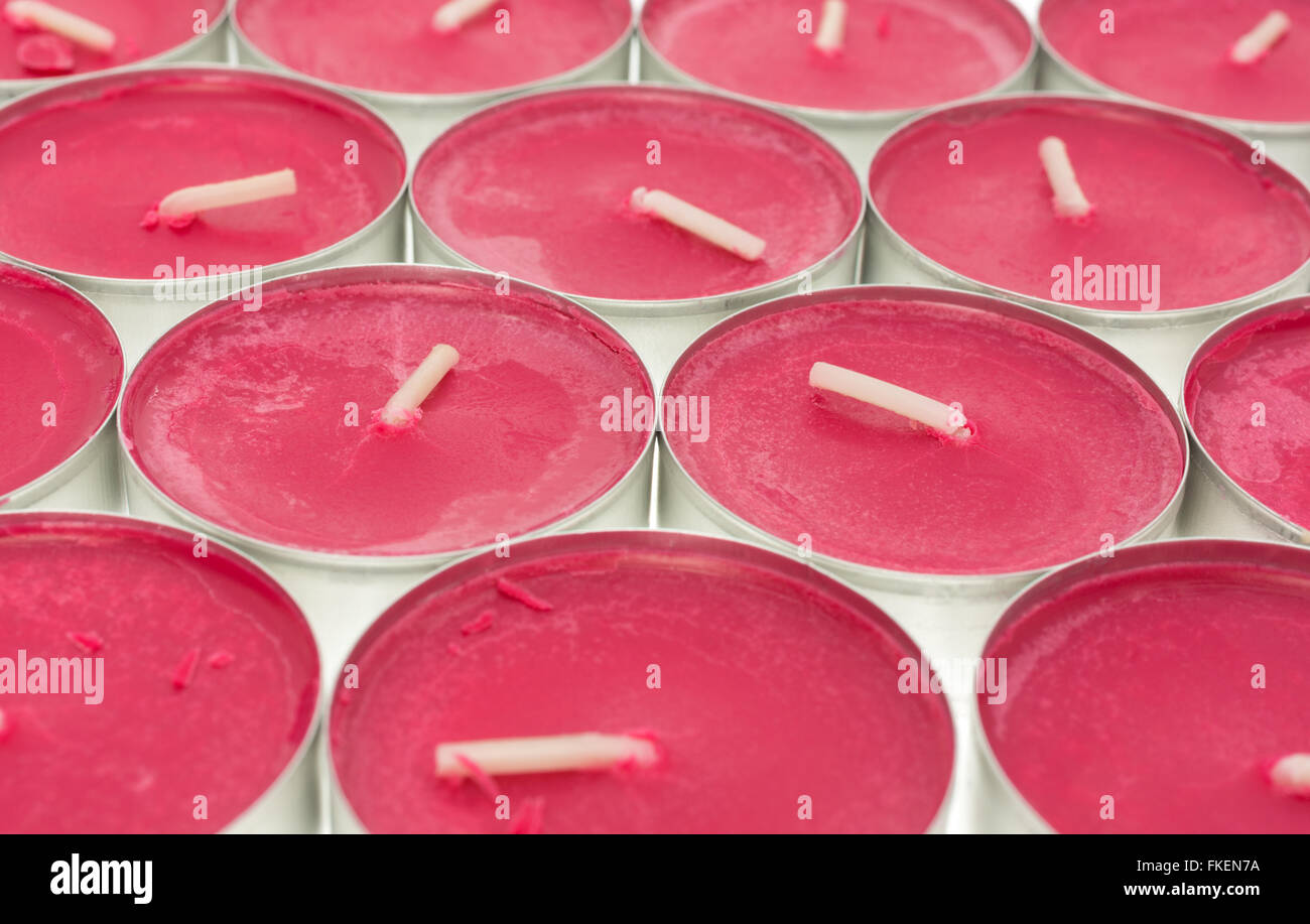 Side view of a group of a scented tea light candles in rows Stock Photo ...