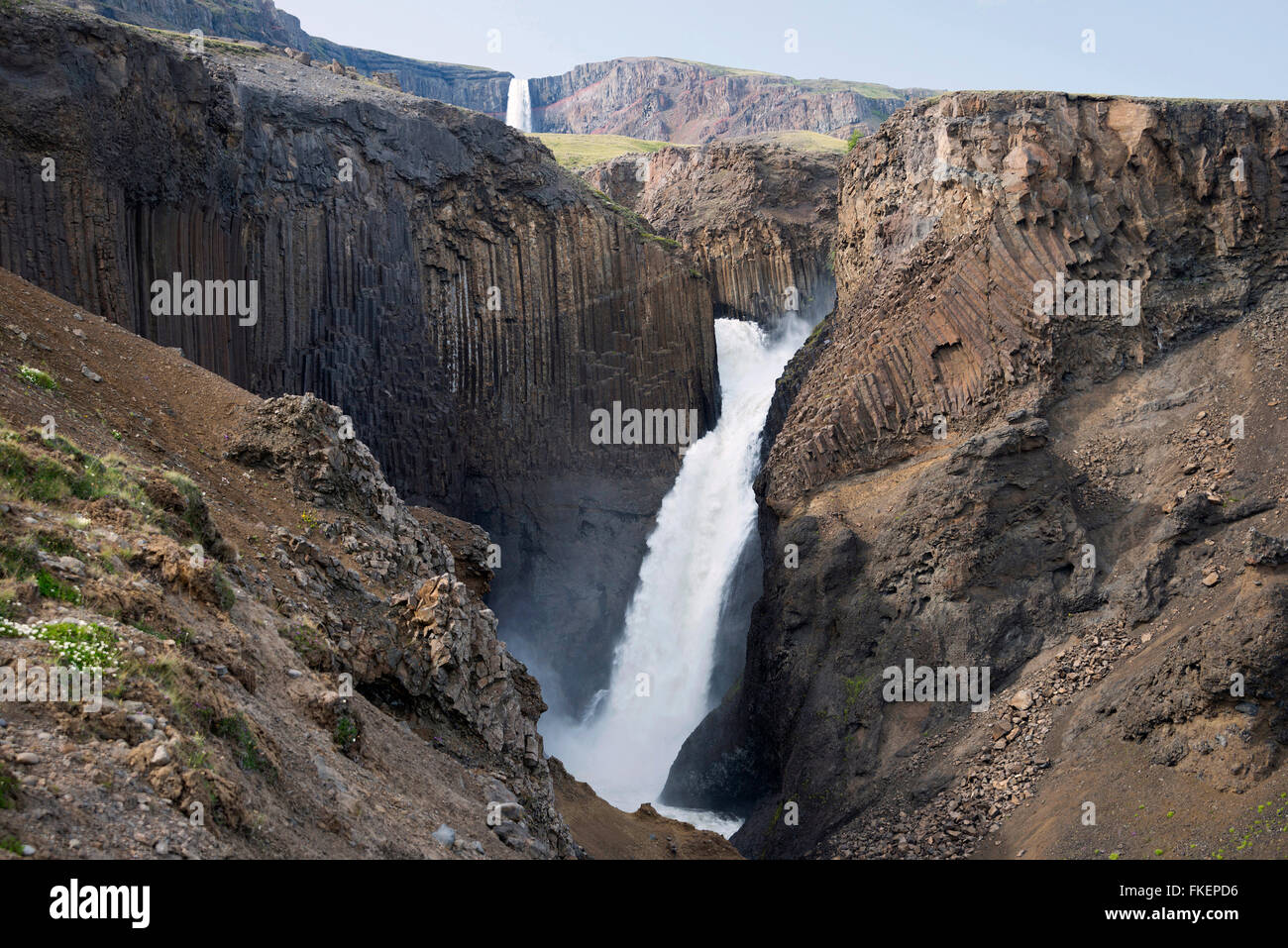 Waterfall Litlanesfoss between basalt columns, Egilsstaðir, Austurland ...