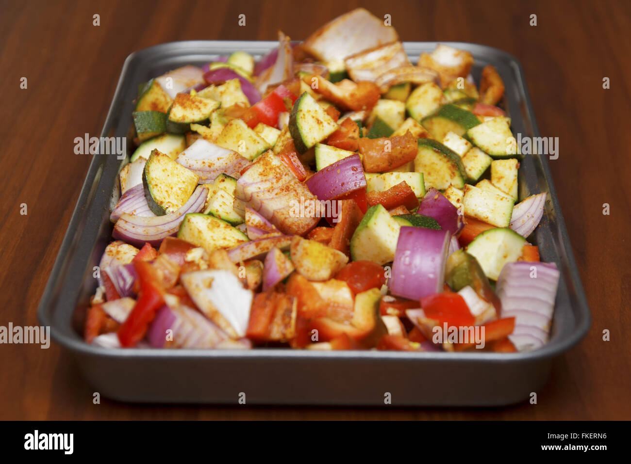 Fresh seasoned vegetables for roasting Stock Photo - Alamy