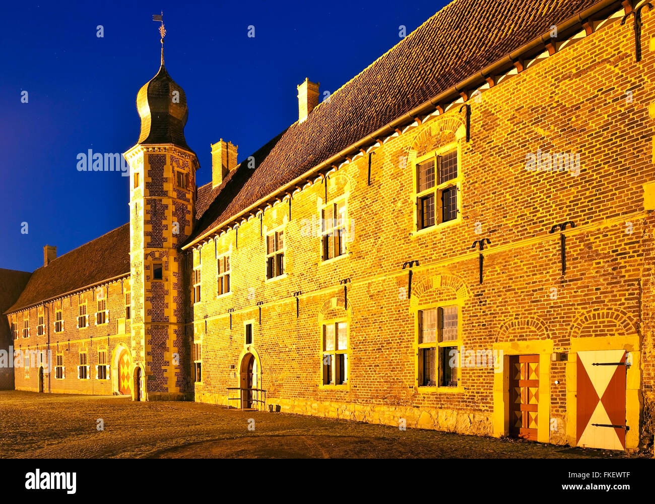 Raesfeld Castle, illuminated west wing facade facing the courtyard at ...