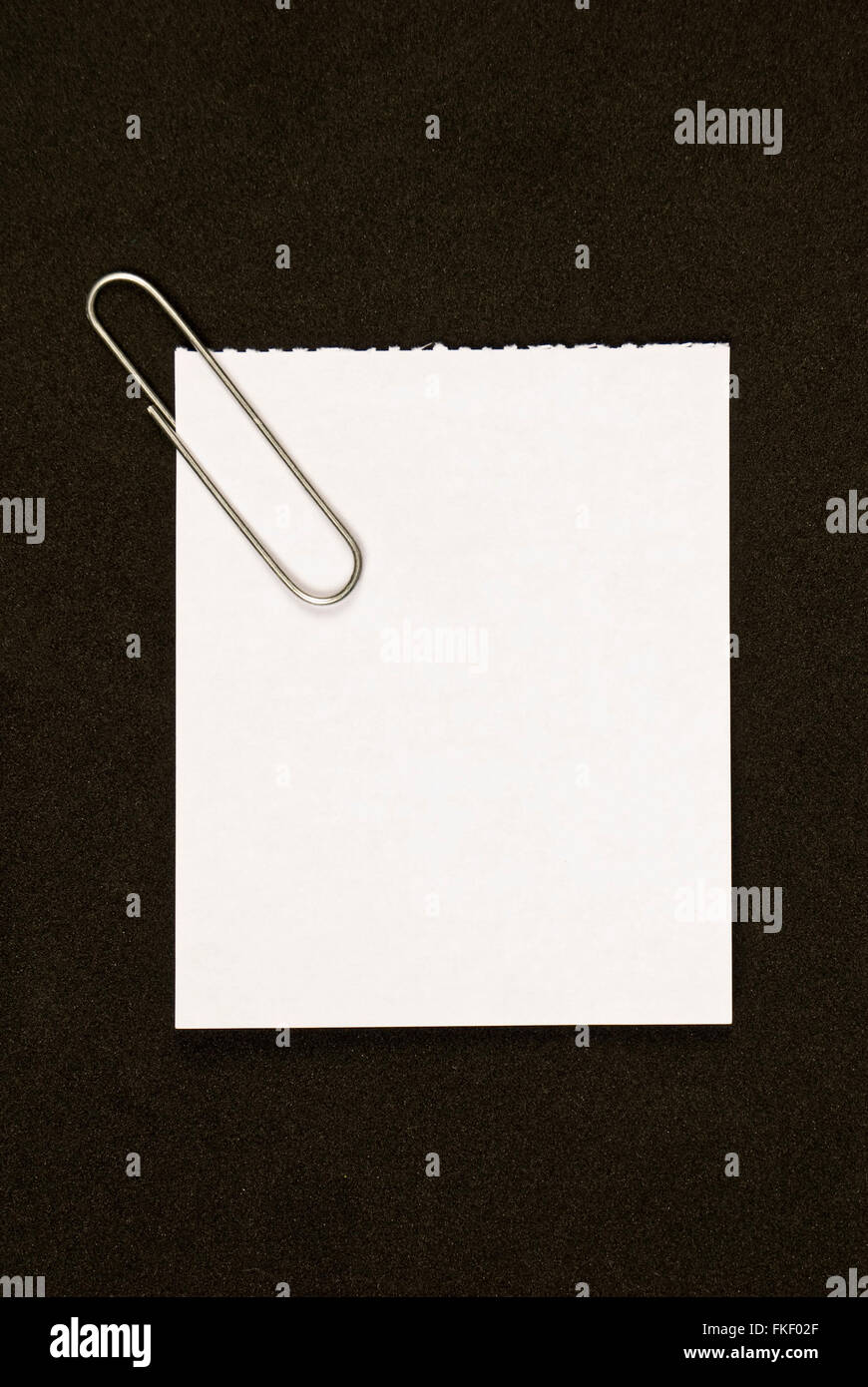Note Paper With Paperclip Stock Photo - Alamy