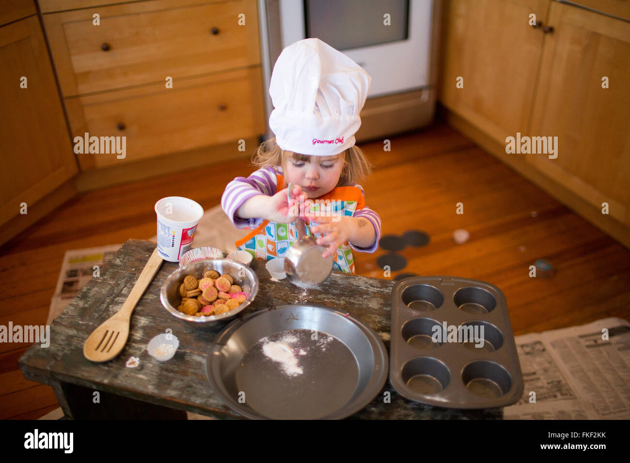 Little chef cooking in the kitchen Stock Photo - Alamy