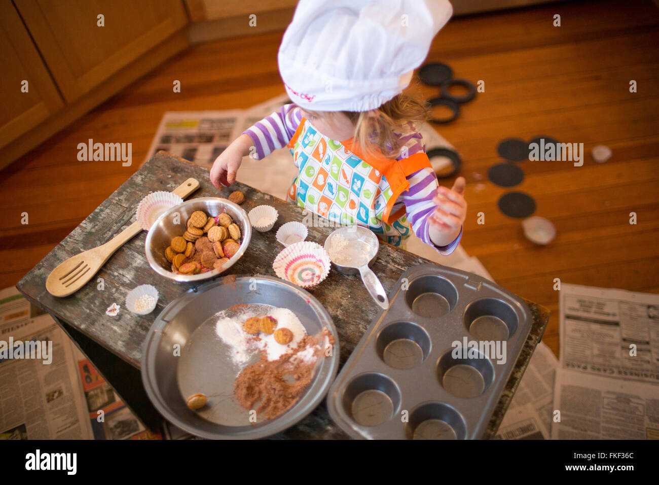 Little chef cooking in the kitchen Stock Photo - Alamy
