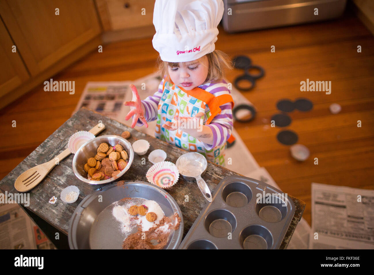 Little chef cooking in the kitchen Stock Photo - Alamy