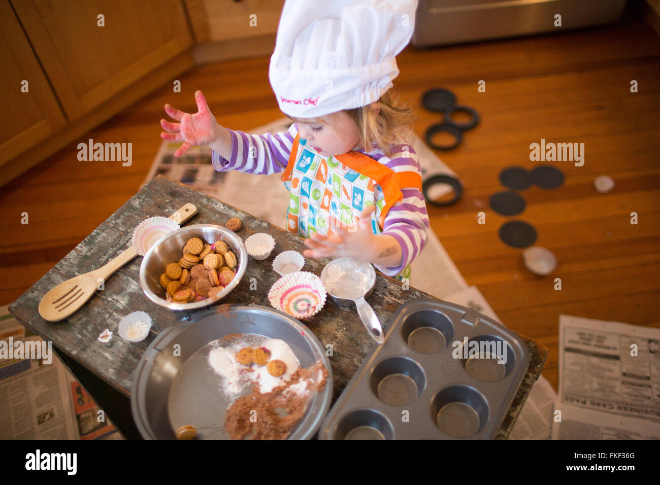 Little chef cooking in the kitchen Stock Photo - Alamy